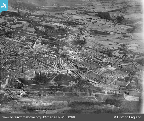 epw051260 ENGLAND (1936). Keighley Railway Station and the town ...