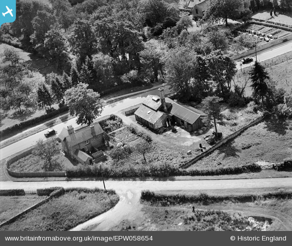 EPW058654 ENGLAND (1938). The junction of Cheltenham Road and ...