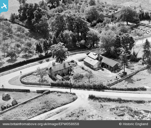 EPW058658 ENGLAND (1938). The junction of Cheltenham Road and ...